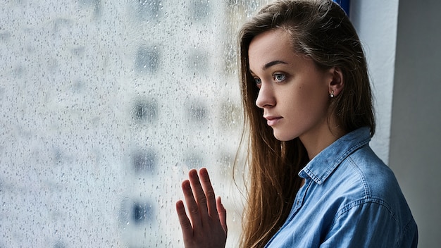 Premium Photo Portrait Of A Young Attractive Brunette Lonely Sad