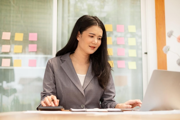 Premium Photo | Portrait of young businesswoman working at home Premium Photo | Portrait of young businesswoman working at home