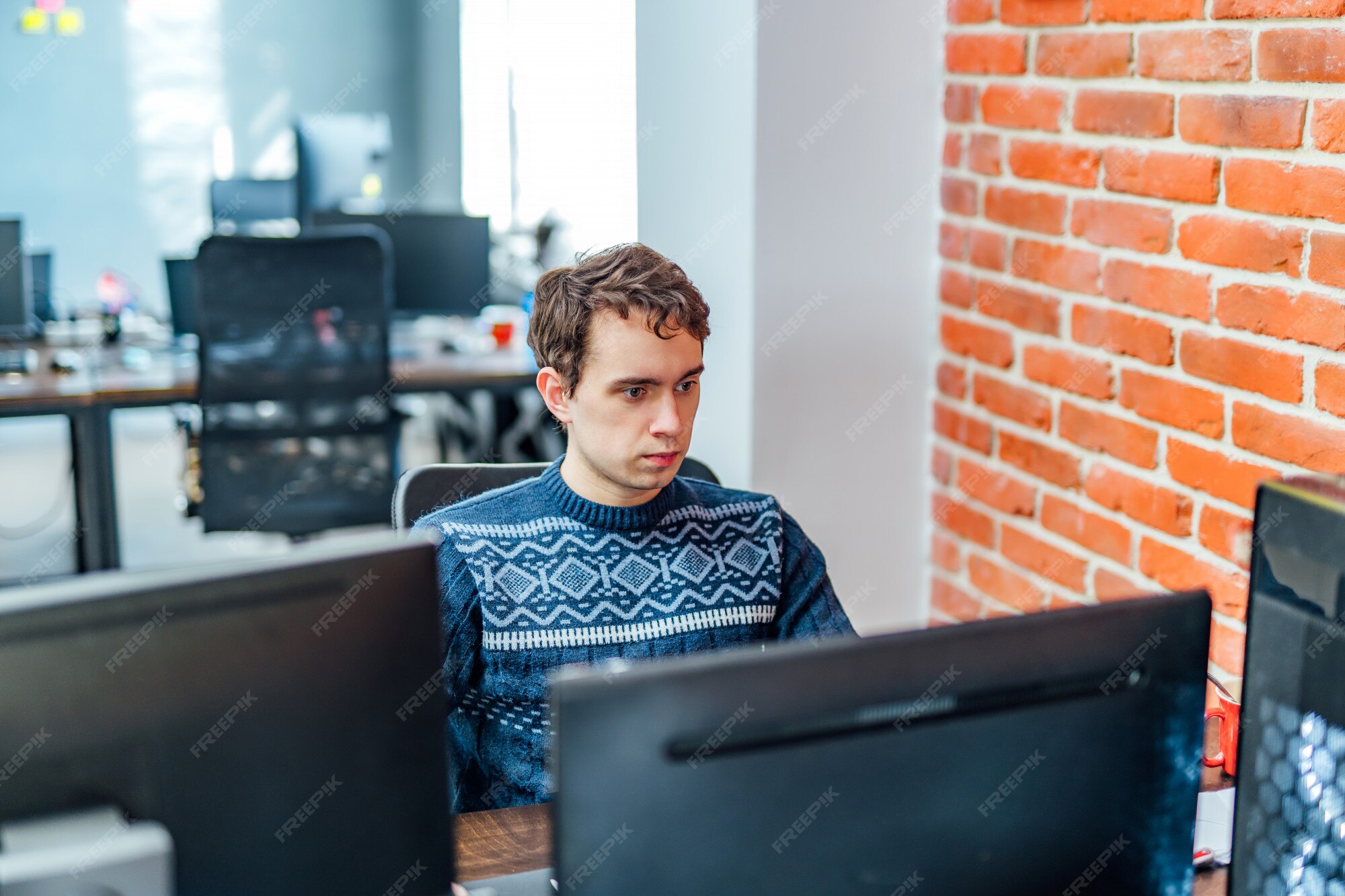 Premium Photo | Portrait young programmer working infice. developing ...