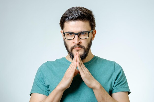 Premium Photo | Portrait of a young serious man Premium Photo | Portrait of a young serious man