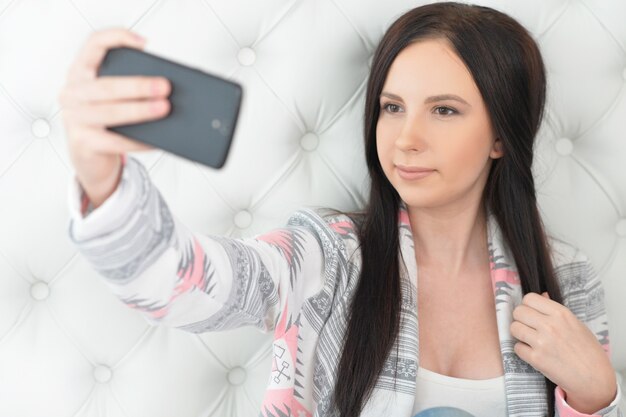 Premium Photo Pretty Girl Taking Selfie With Her Smart Phone