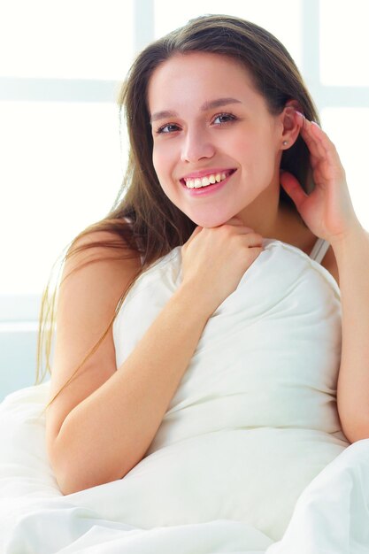 Premium Photo Pretty Woman Lying Down On Her Bed At Home