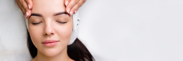Premium Photo Professional Antiaging Facial Massage Action Relaxing