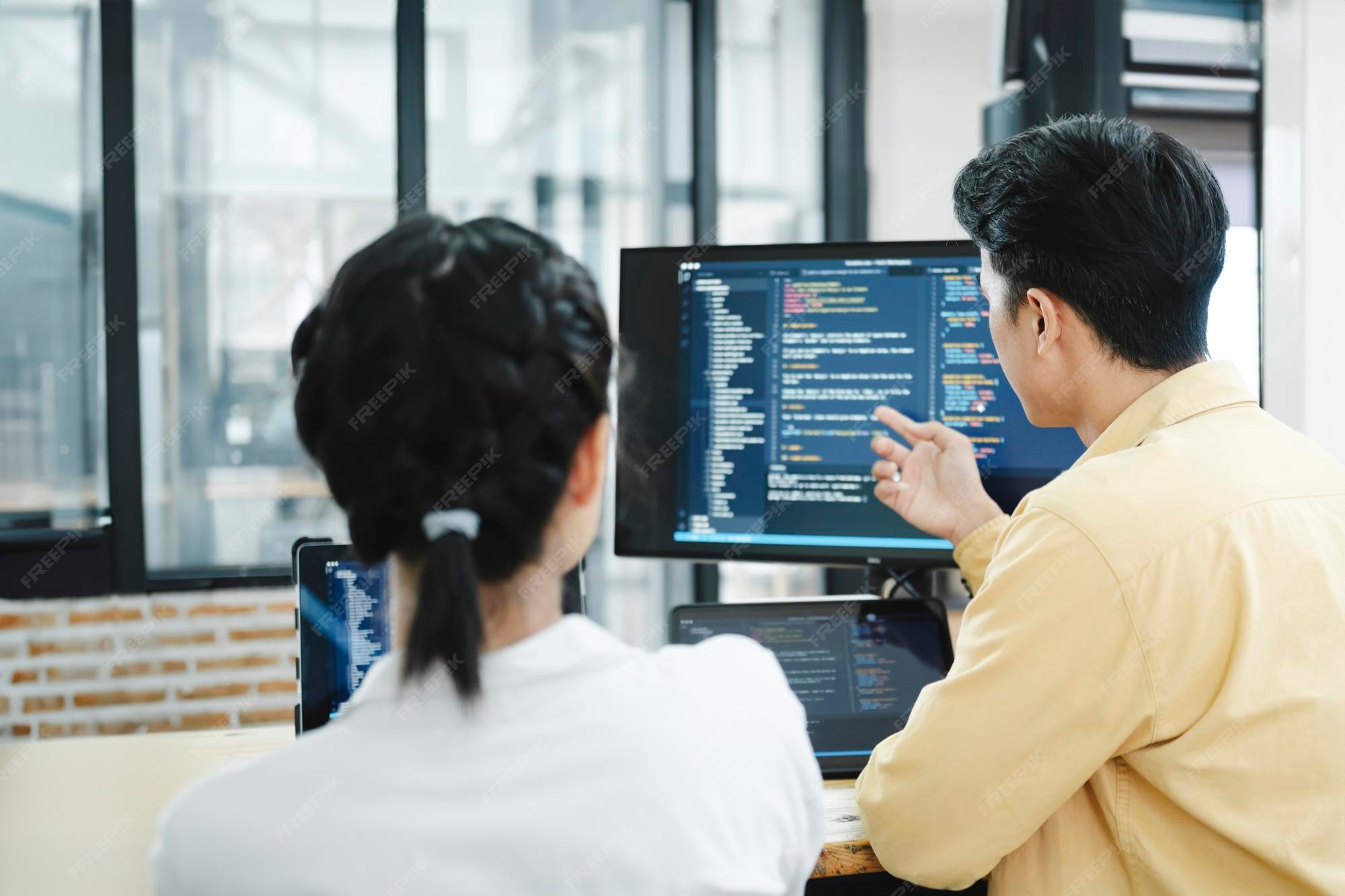 Premium Photo | Programmer coding and developing software or application project