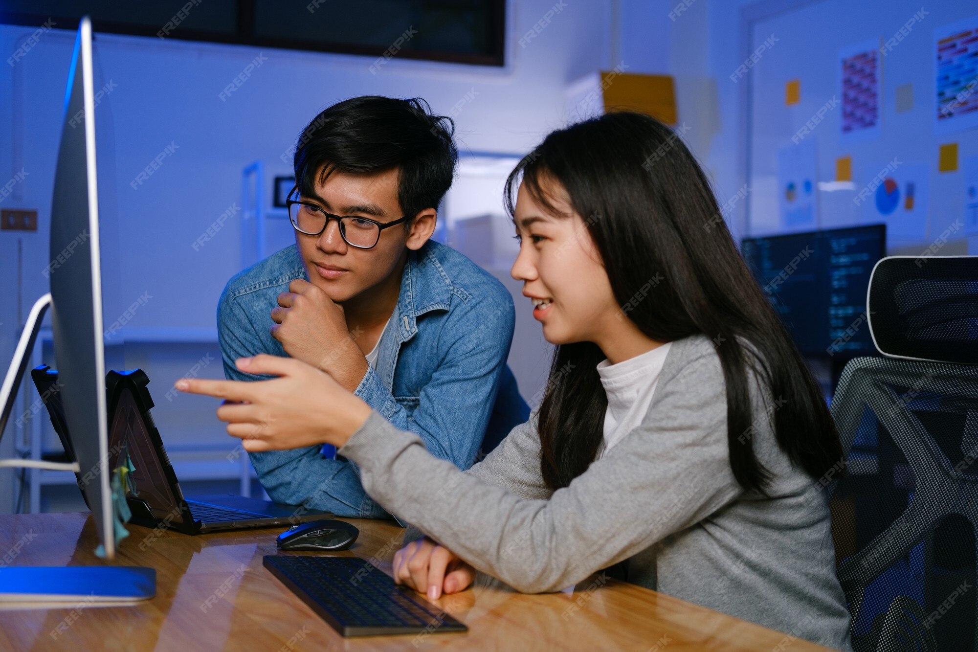 Premium Photo | Programmer and developer teamwork working in a software development and coding ...