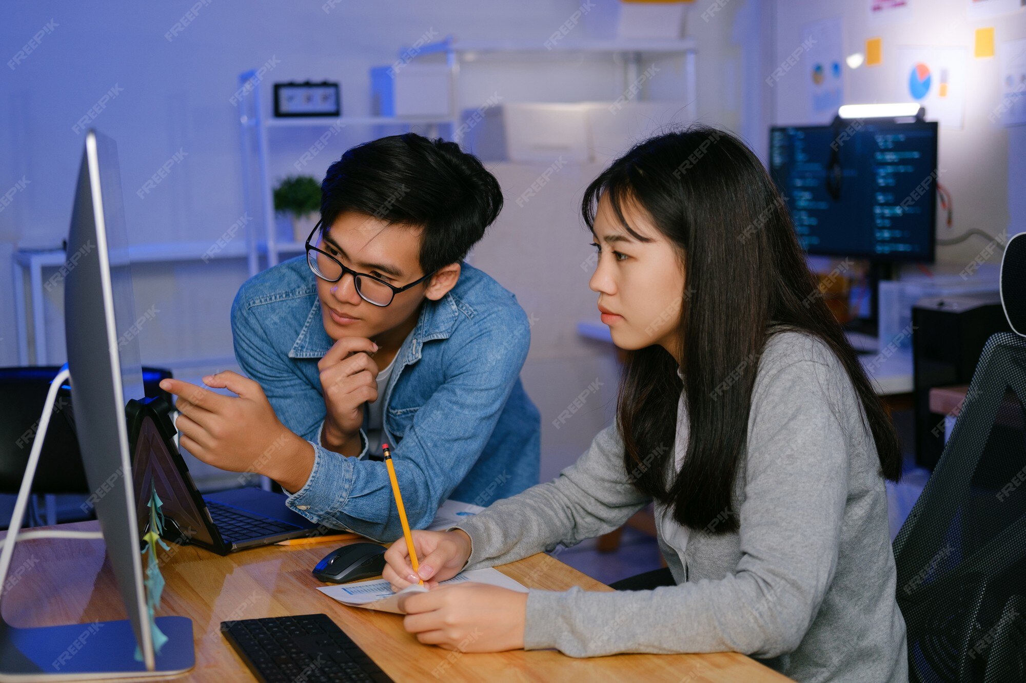 Premium Photo | Programmer and developer teamwork working in a software ...