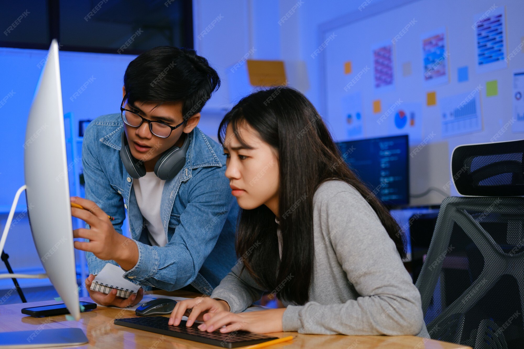 Premium Photo | Programmer and developer teamwork working in a software development and coding ...