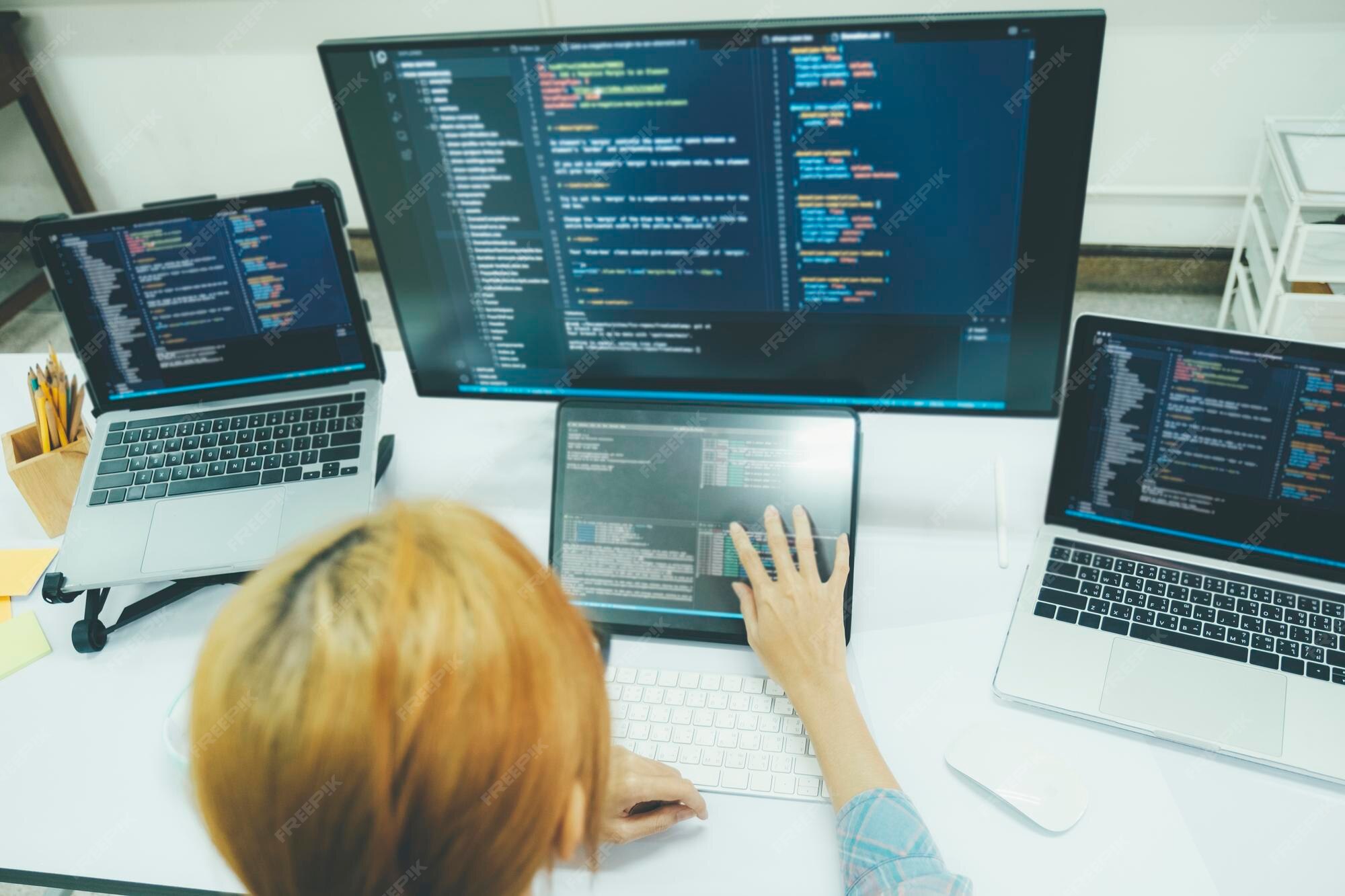 Premium Photo | Programmer is coding and programming software