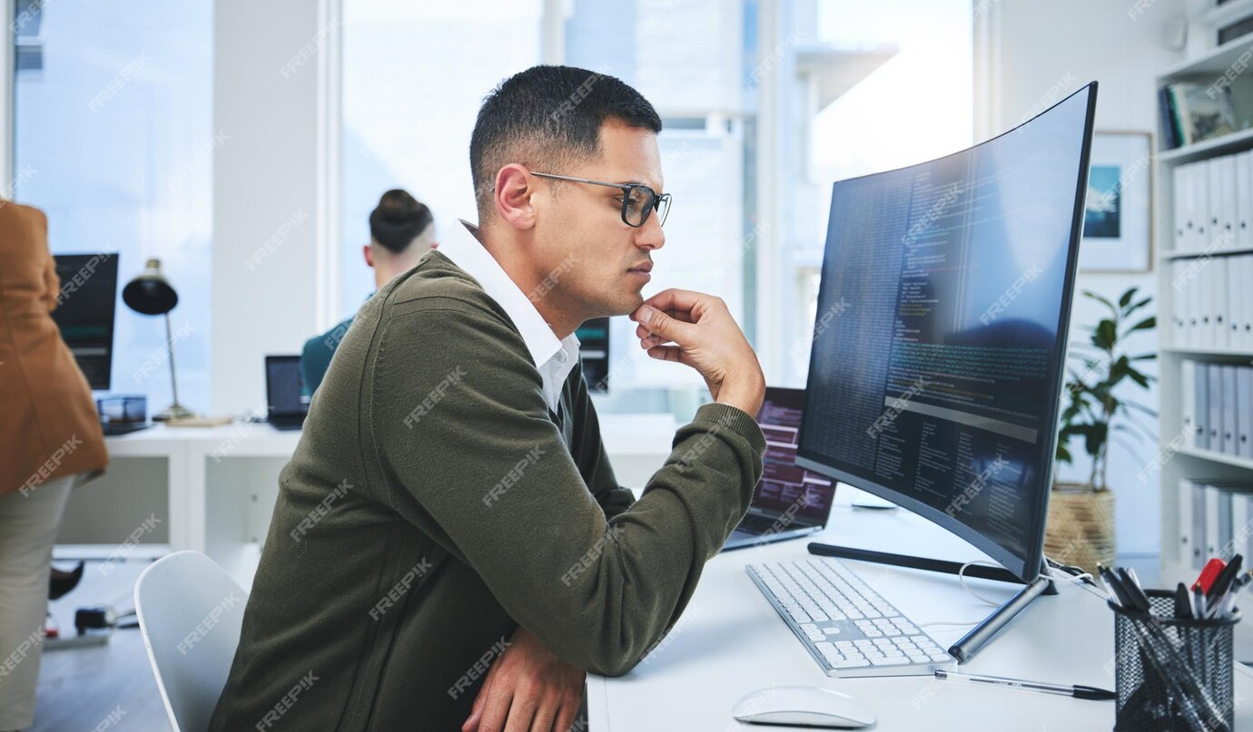 Premium Photo Programmer Man Software Development And Thinking At Computer For Coding Software