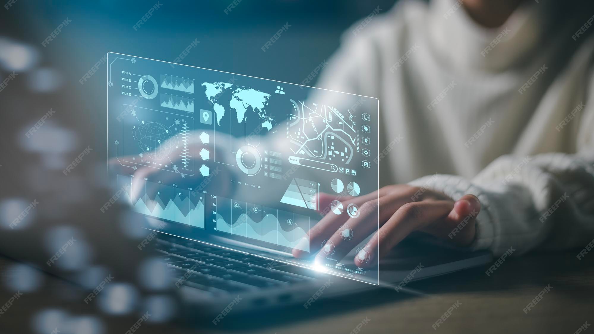 Premium Photo | The programmer uses a laptop to analyze and developing at various information on ...