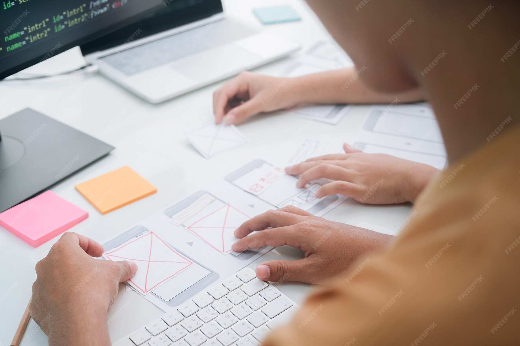 Premium Photo | Programmer and ux ui designer working in a software ...