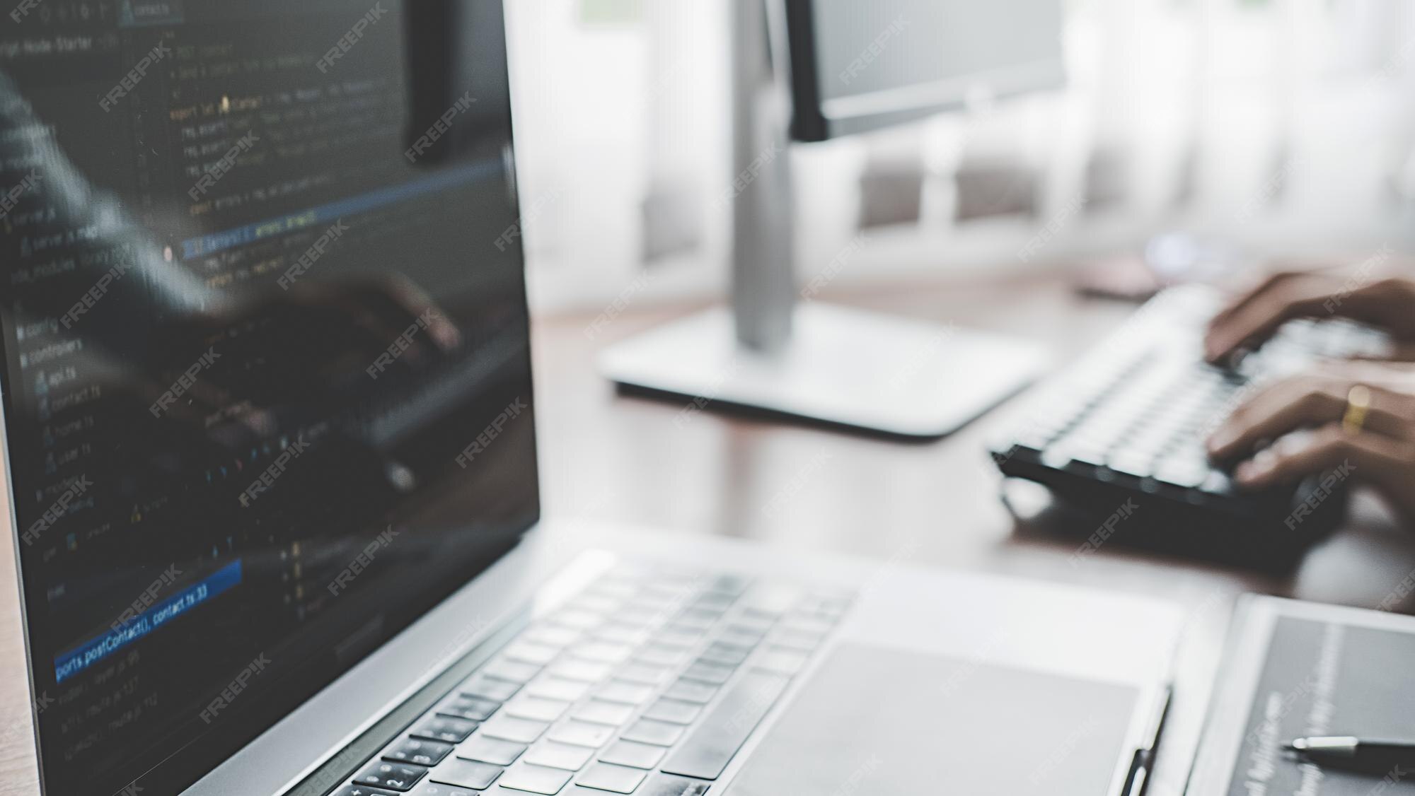 Premium Photo | Programmer working in a software development and coding ...