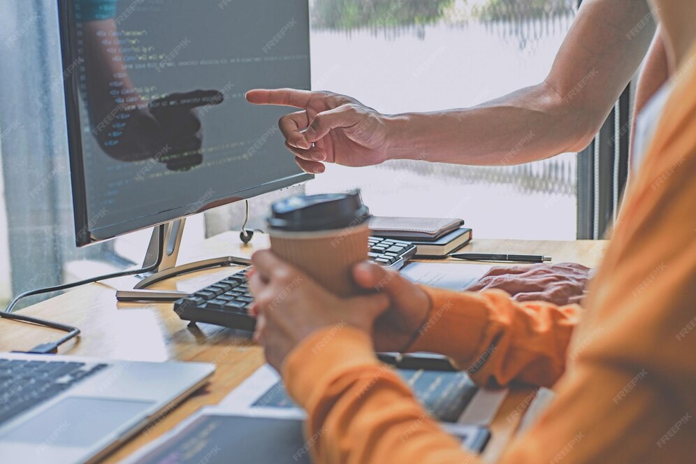 Programmers Cooperating At Developing Programming And Website Working In A Software Develop