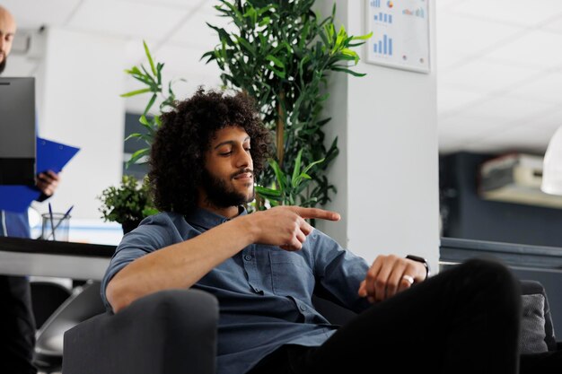 Premium Photo | Punctual arab start up company manager checking time Premium Photo | Punctual arab start up company manager checking time