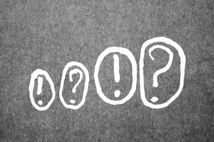 Premium Photo | Question and exclamation marks written in white on a ... Premium Photo | Question and exclamation marks written in white on a ...