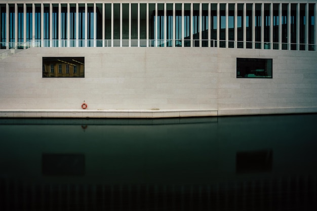 Premium Photo | Reflection of building on swimming pool Premium Photo | Reflection of building on swimming pool