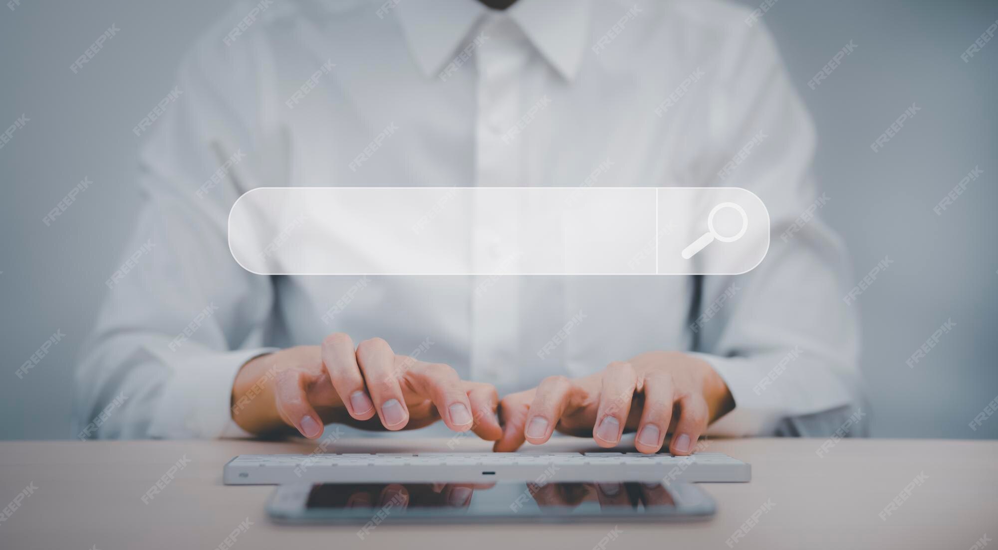 Premium Photo | Searching browsing internet data information with blank search bar mans hands ...