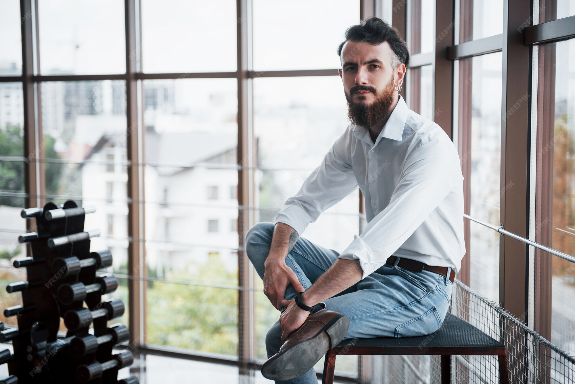 Premium Photo A Seductive Man In A White Shirt Looking At The Camera