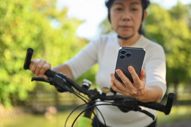 Premium Photo | Senior woman hand using mobile phone checking route map ... Premium Photo | Senior woman hand using mobile phone checking route map ...