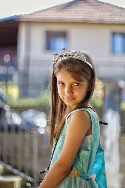 Premium Photo Side View Portrait Of Innocent Girl Wearing Tiara
