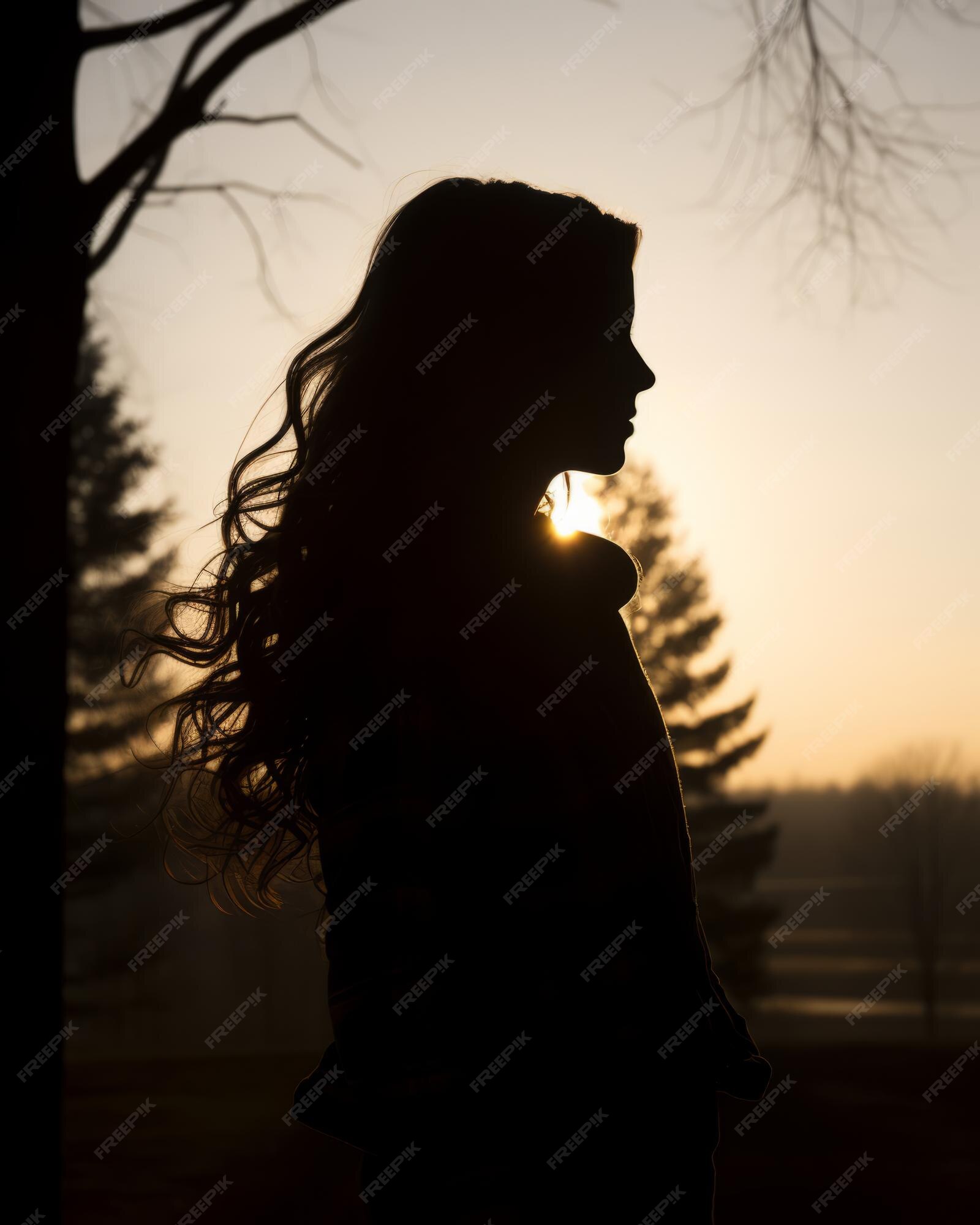 Premium Ai Image Silhouette Of A Woman Standing In Front Of A Tree At