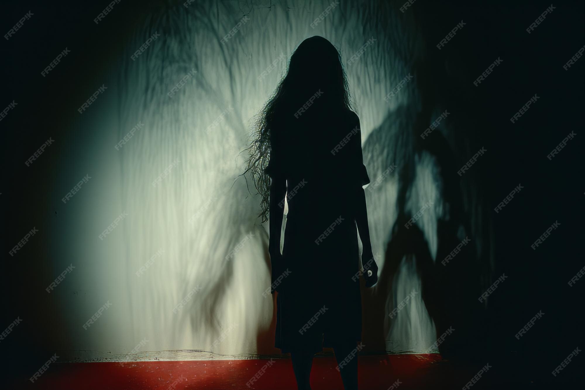 Premium Photo A Silhouette Of A Woman Standing In Front Of A Tree