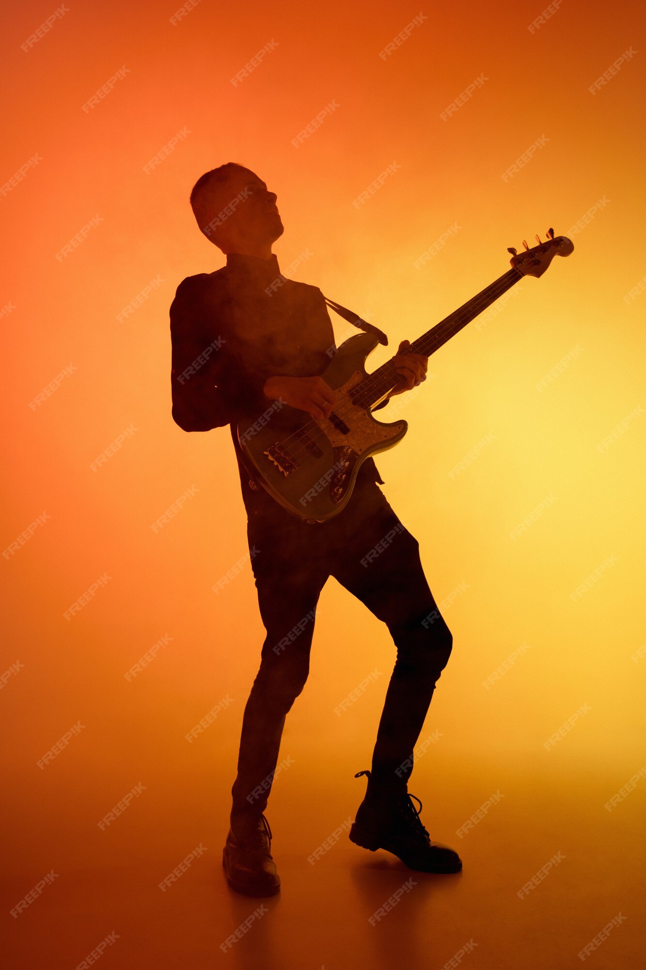 Premium Photo Silhouette Of Young Caucasian Male Guitarist Isolated