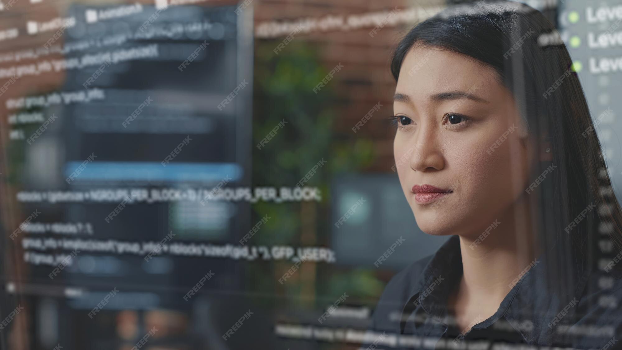 Premium Photo Skilled Asian Programmer Using Ar Technology To Visualize Script Writing Code 8660