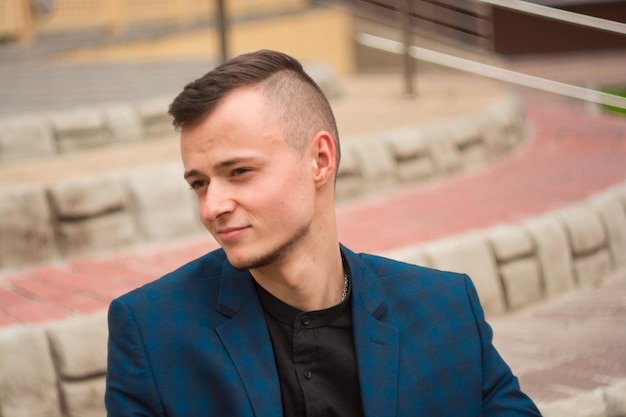 Premium Photo | Smiling handsome man looking away Premium Photo | Smiling handsome man looking away