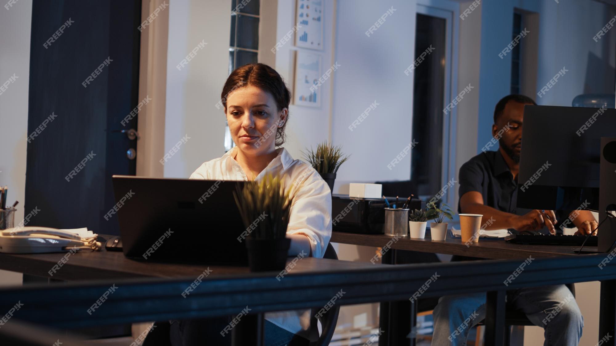 Premium Photo Smiling Software Developer Planning Network Report On Laptop Working With