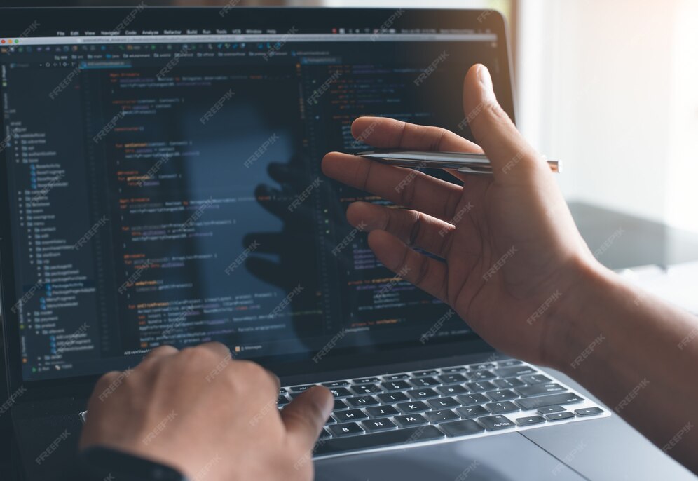 Premium Photo | Software developer coding javascript on laptop computer
