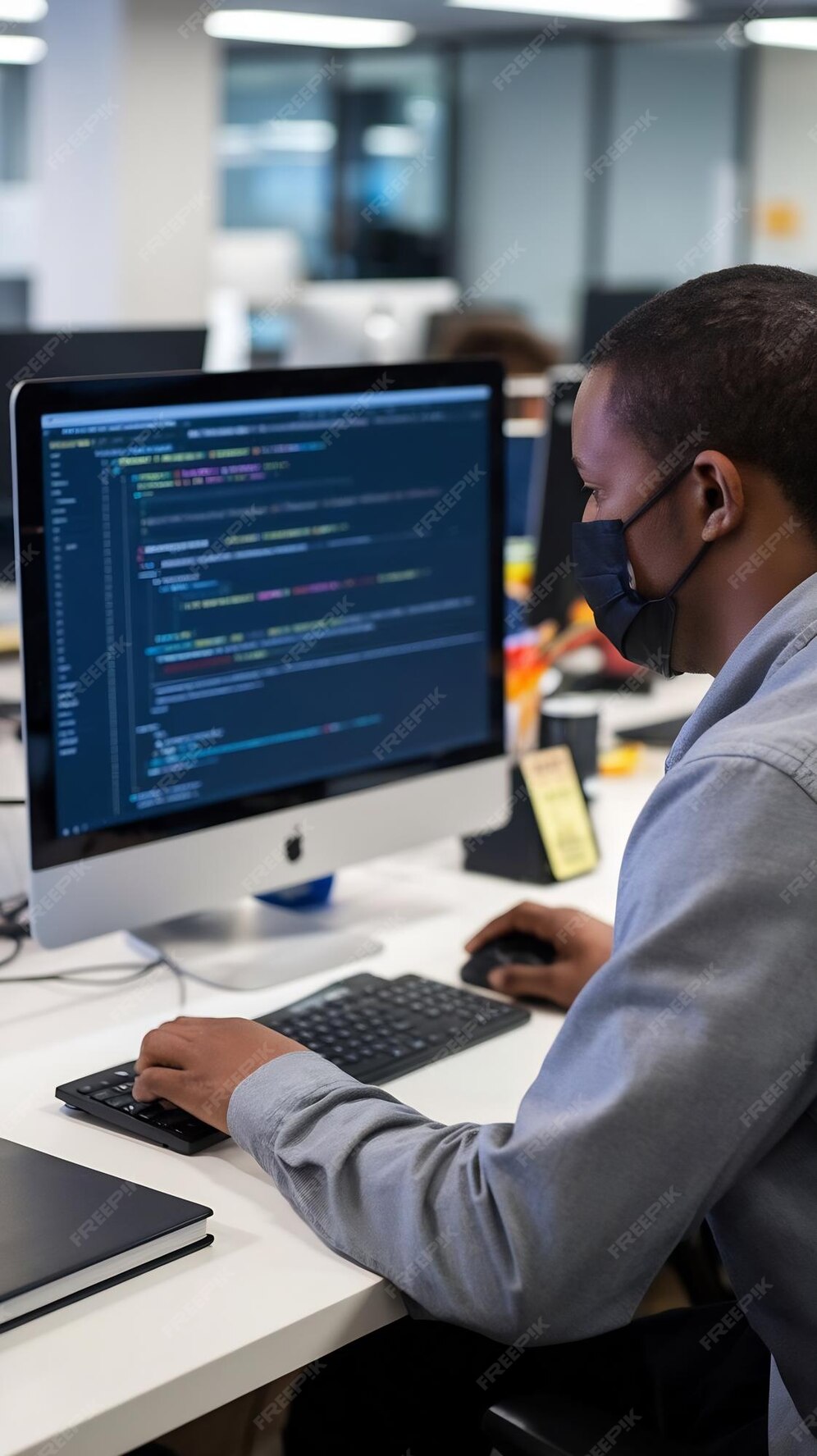 Software developer typing javascript code on computer to develop online cloud computing ...