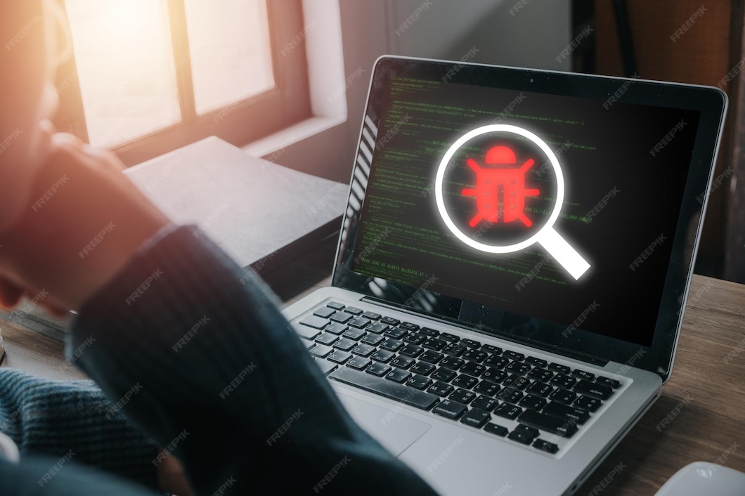 Premium Photo | Software development and debugging concept Person hand using laptop computer ...