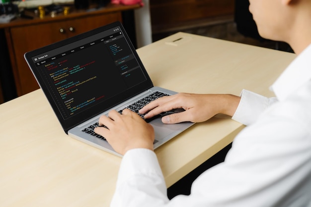 Premium Photo | Software development programming on computer screen for modish application and ...