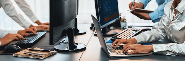 Premium Photo Software Development Team Working Together In Office Coding Script Display On