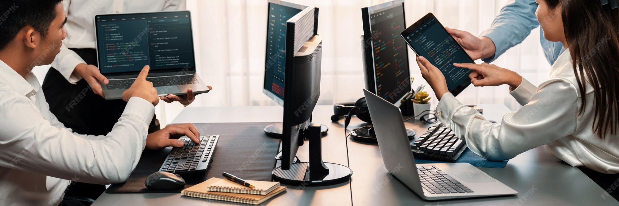 Premium Photo | Software development team working together in office ...