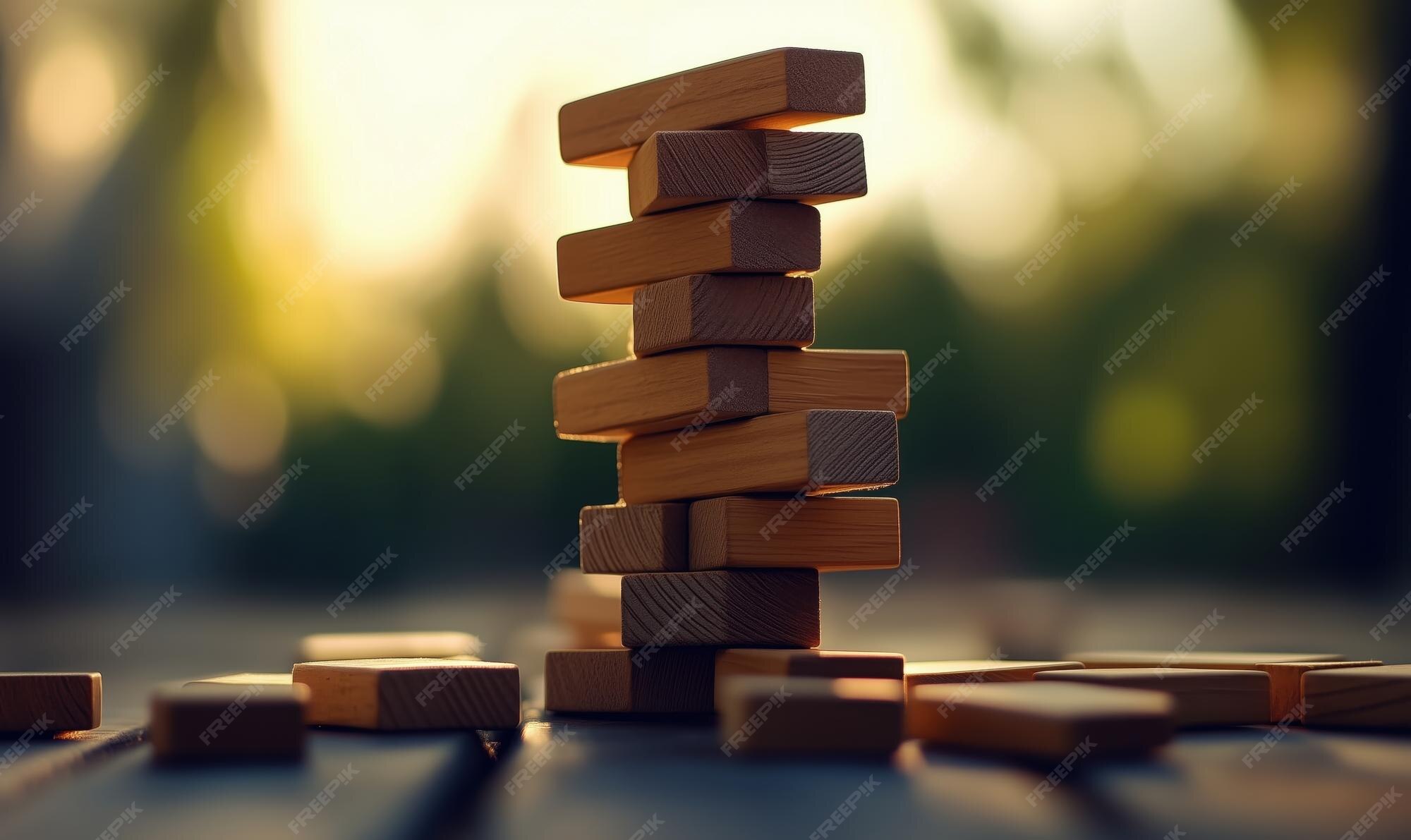 A stack of wooden blocks with one block missing The blocks are arranged ...