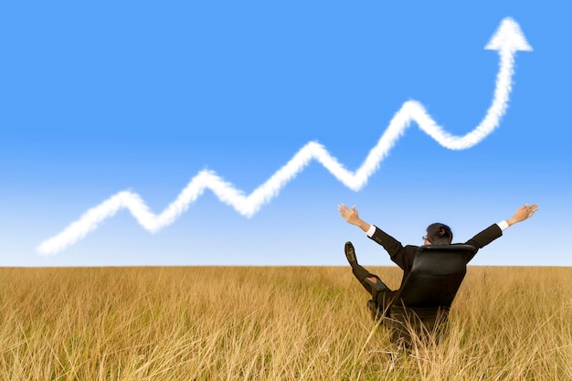 Premium Photo | Success businessman and growth graph cloud Premium Photo | Success businessman and growth graph cloud