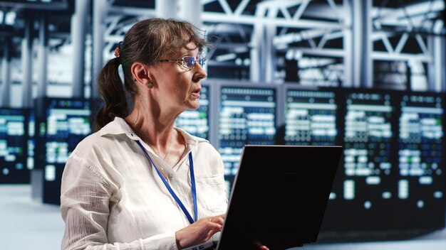 Premium Photo | Supervisor runs code in data center Premium Photo | Supervisor runs code in data center