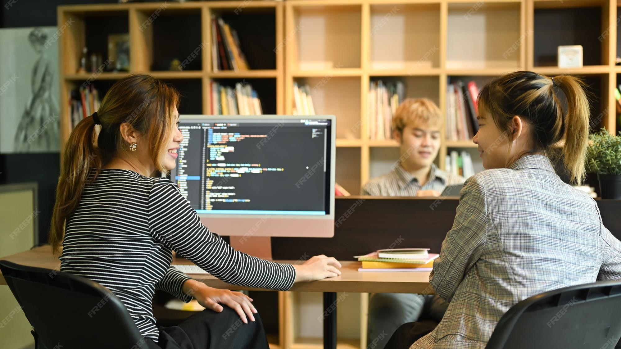 Premium Photo | Team of software development brainstorming working with coded data in corporate ...