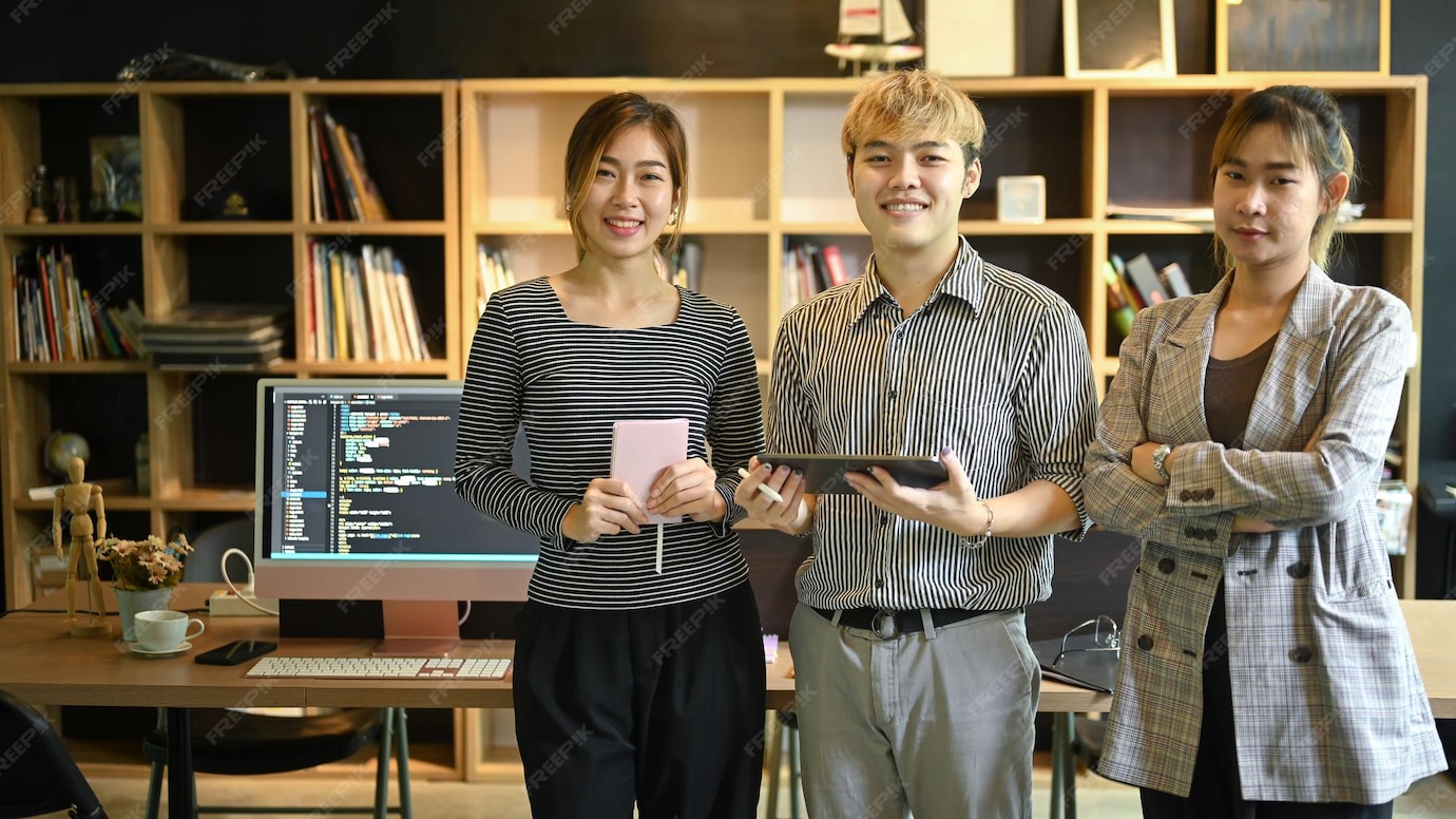 Premium Photo | Team of software development brainstorming working with coded data in corporate ...