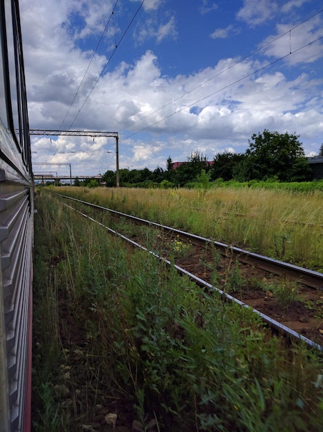 Premium Photo | Train near train tracks Premium Photo | Train near train tracks