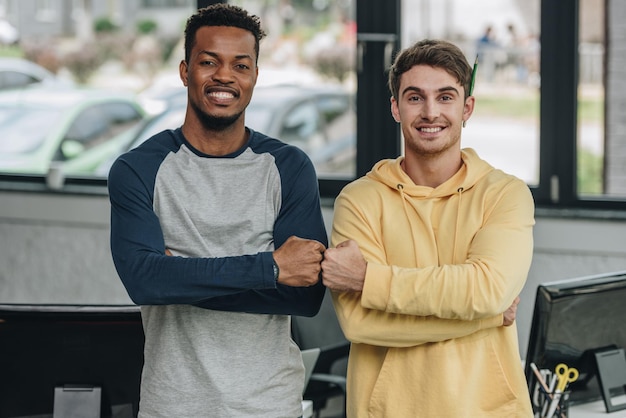 Premium Photo | Two happy multicultural programmers smiling at camera ... Premium Photo | Two happy multicultural programmers smiling at camera ...