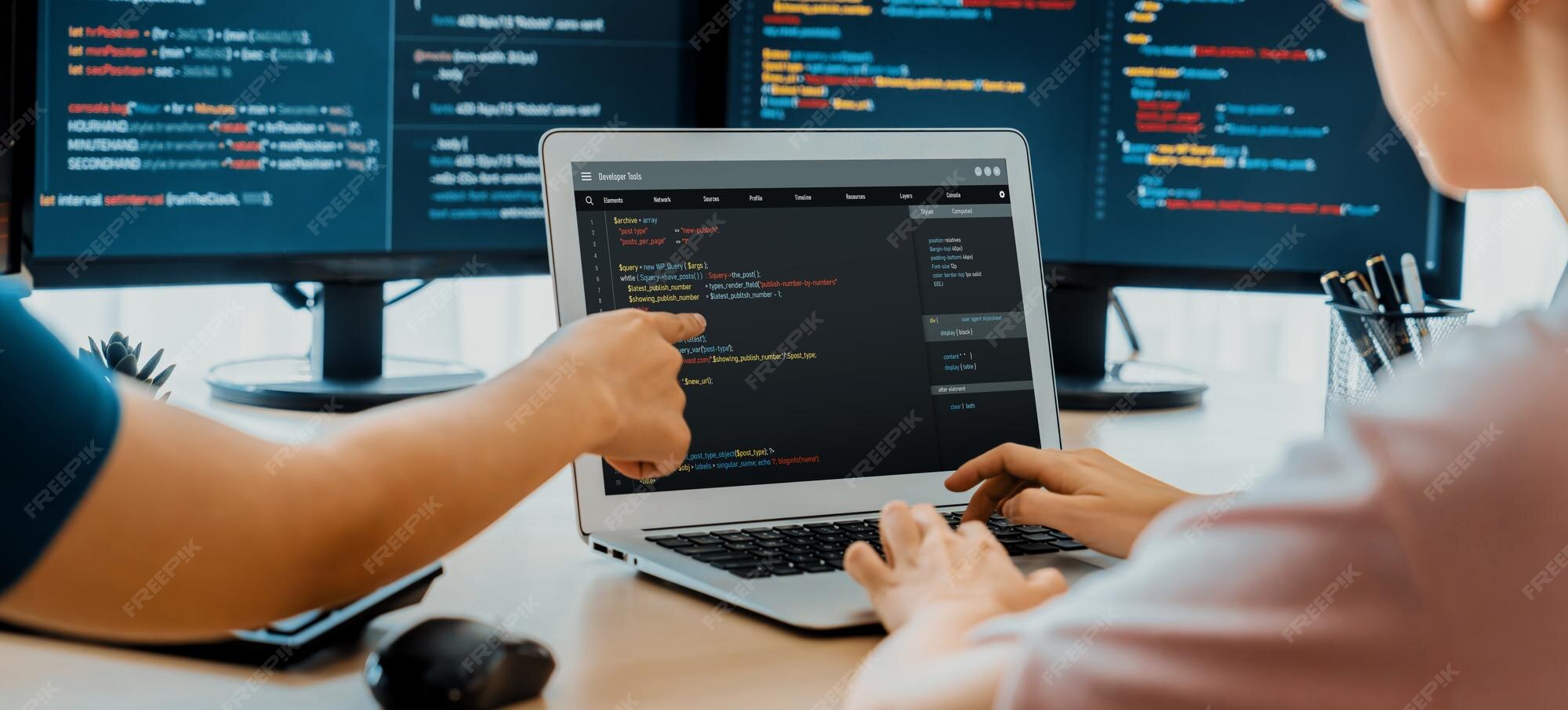 Premium Photo | Two smart cooperative computer engineers working together as teamwork to solve ...