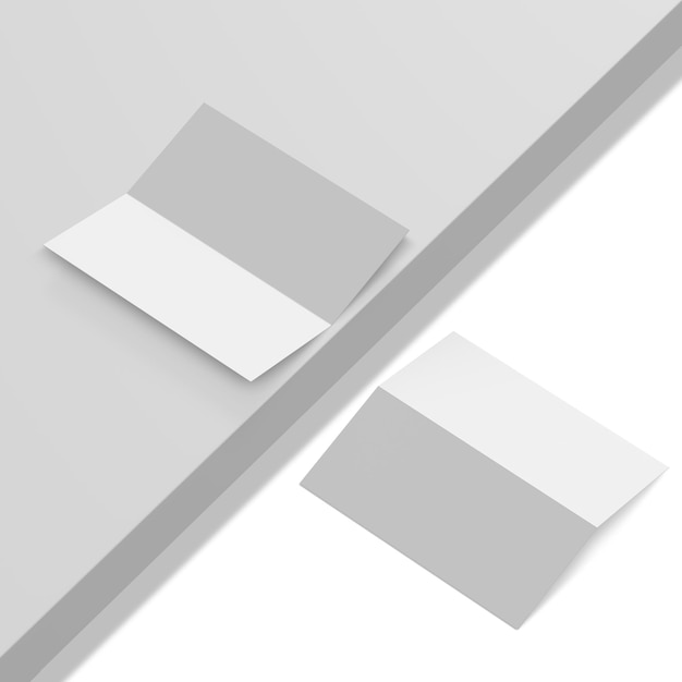 Premium Photo | Two white papers are on a grey surface. Premium Photo | Two white papers are on a grey surface.