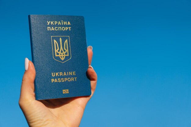 Premium Photo Ukrainian Passport In Hand Ukrainian