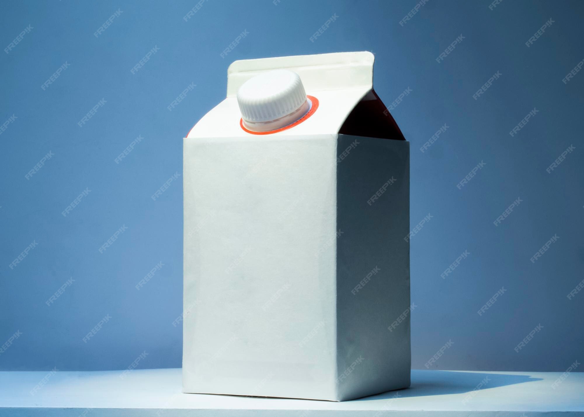 Premium Photo A White Carton Of Milk With A Cap On It