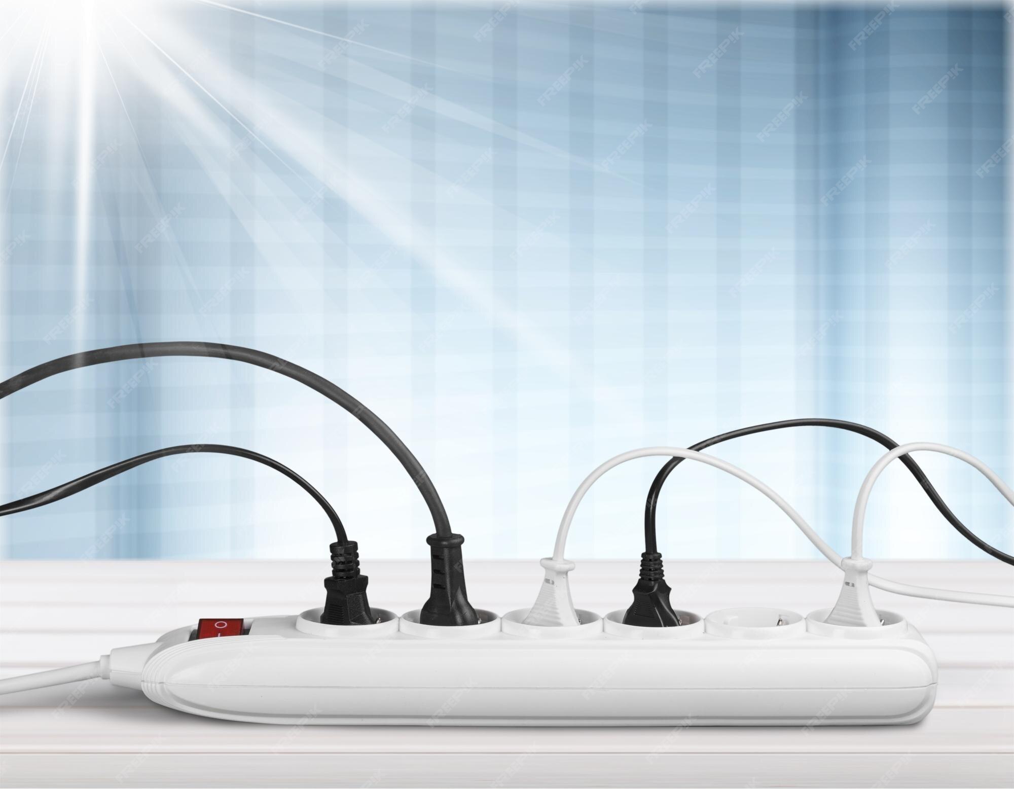 Premium Photo | White multiple socket and plugs Premium Photo | White multiple socket and plugs