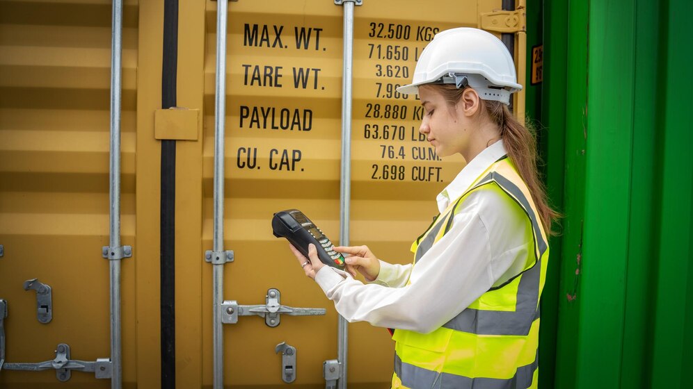 Premium Photo Woman Foreman And Operator Using Credit Card Swipe Machine For Checking Code Of