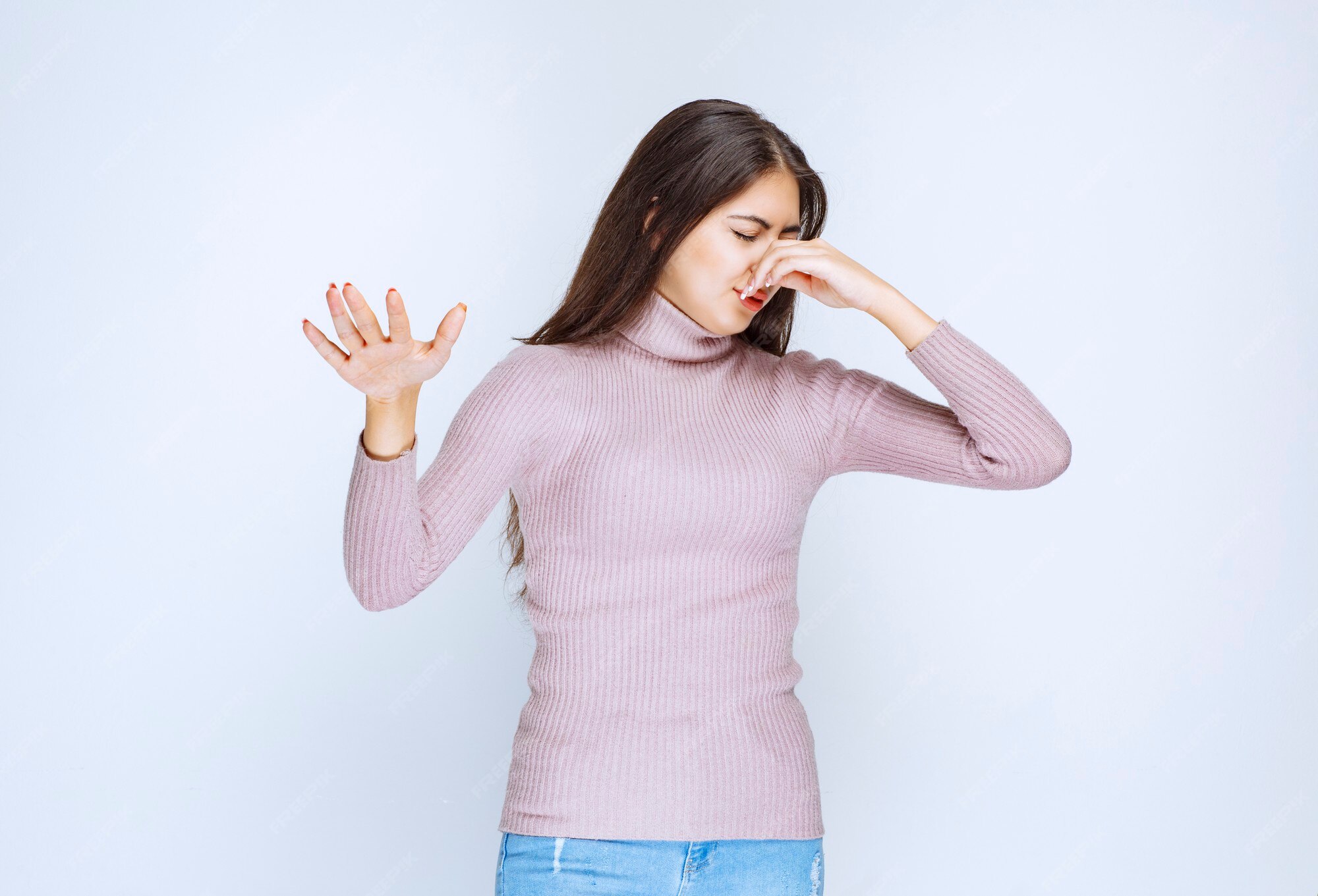 Premium Photo | Woman holding her breath because of bad smell. Premium Photo | Woman holding her breath because of bad smell.